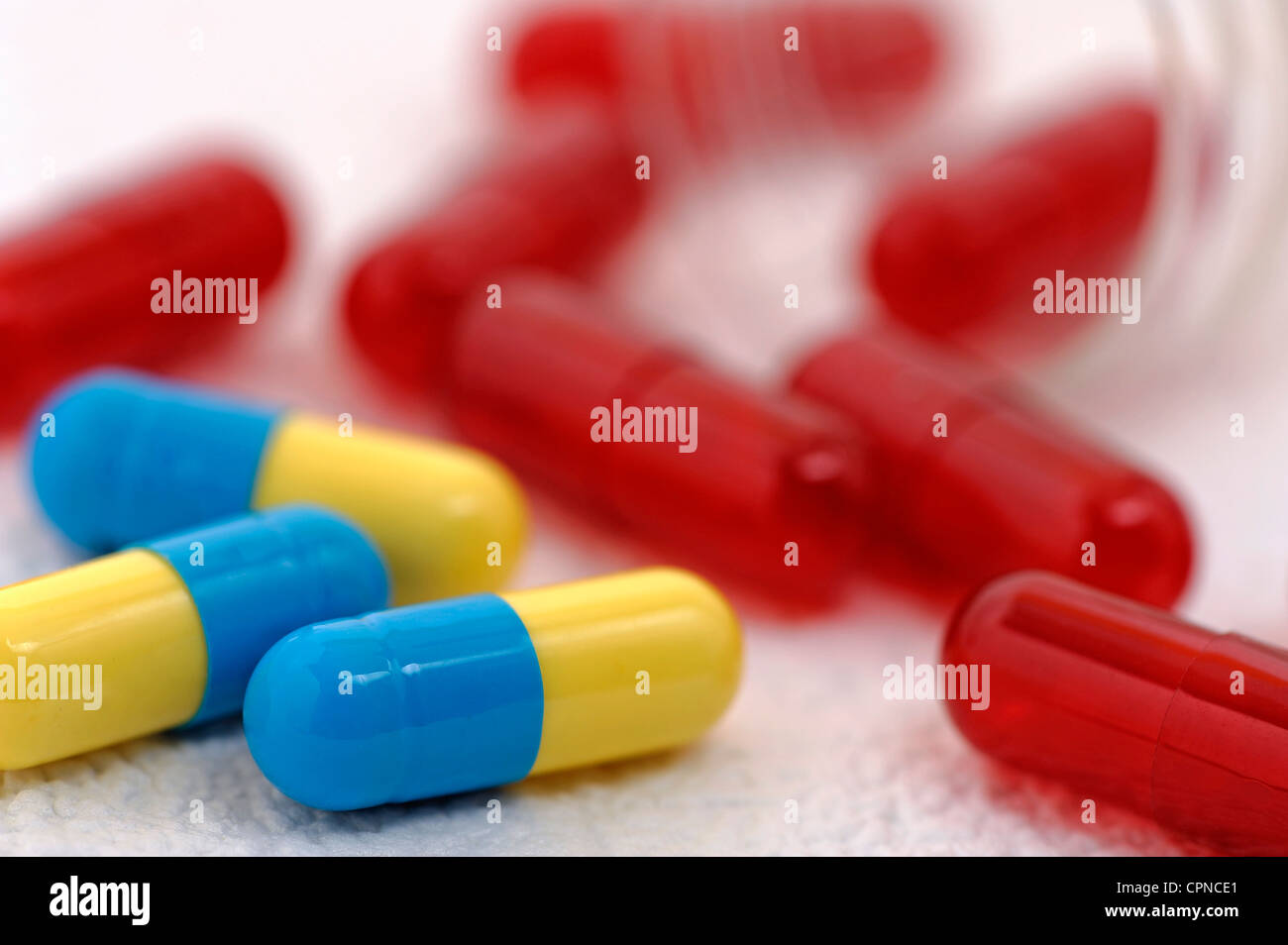 Red yellow capsules drugs hi-res stock photography and images - Alamy