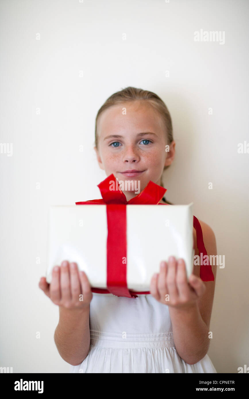 Teen girl holding boxes hi-res stock photography and images - Alamy