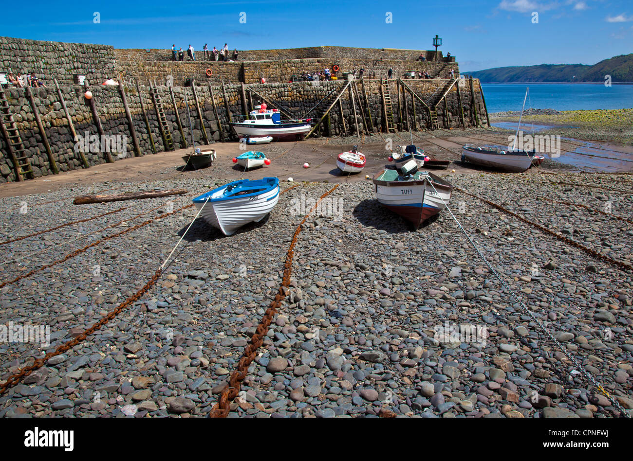Low Tide at Harbour in Clovelly North Devon with Quayside in Background ...