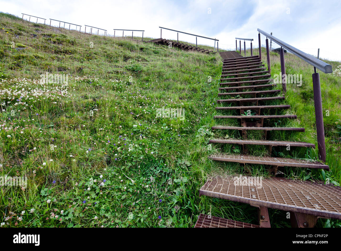 Stairs leading up the hillside to Skogafoss waterfall, Iceland Stock ...