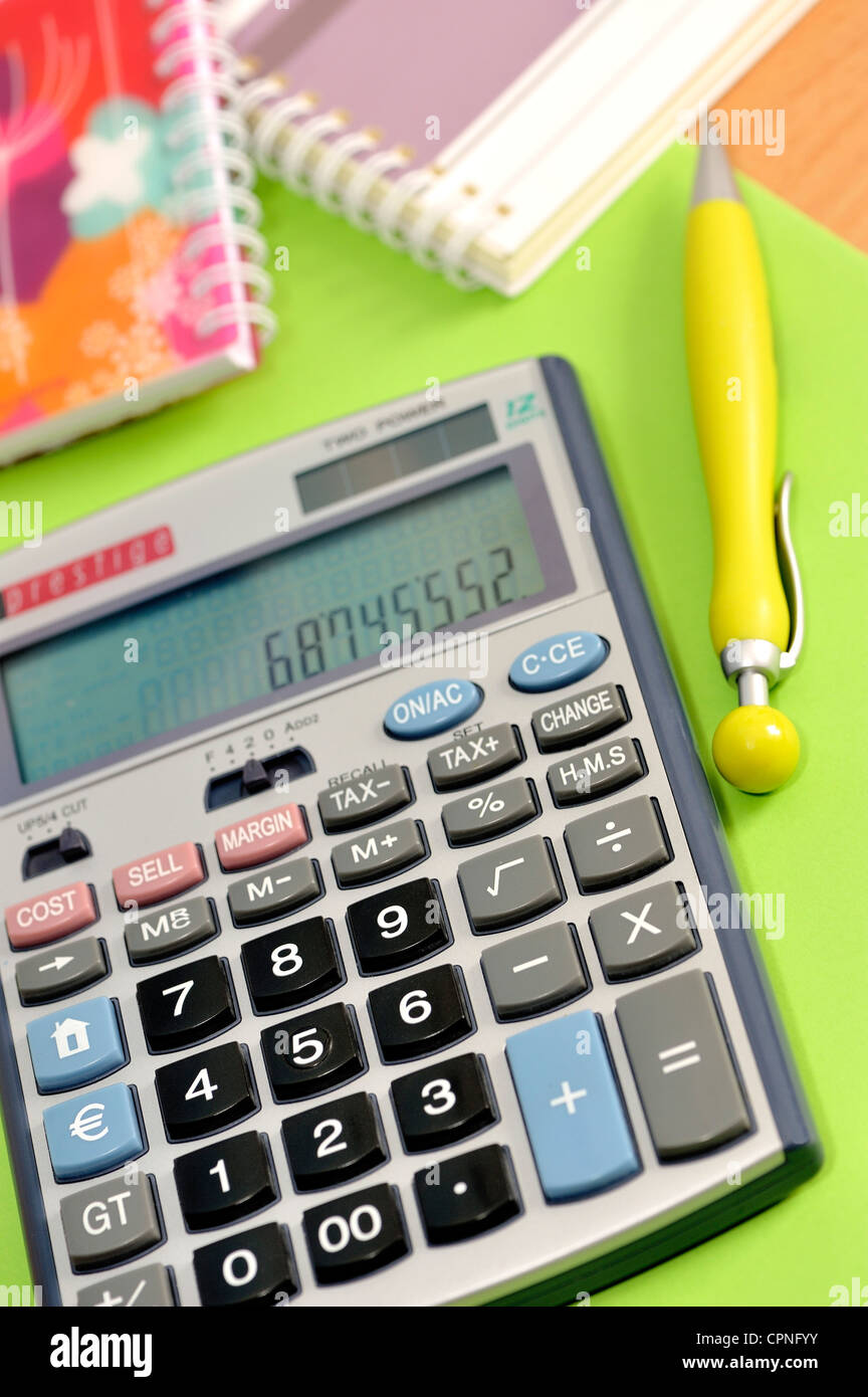 Calculator and books hi-res stock photography and images - Alamy