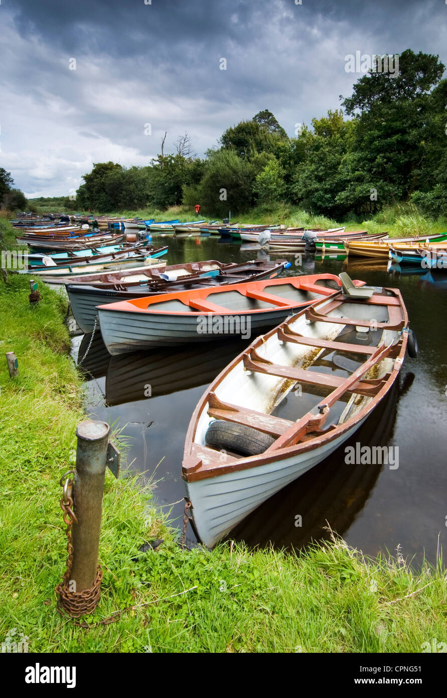 Moored boats on river in Killarney National Park, Ireland Stock Photo ...