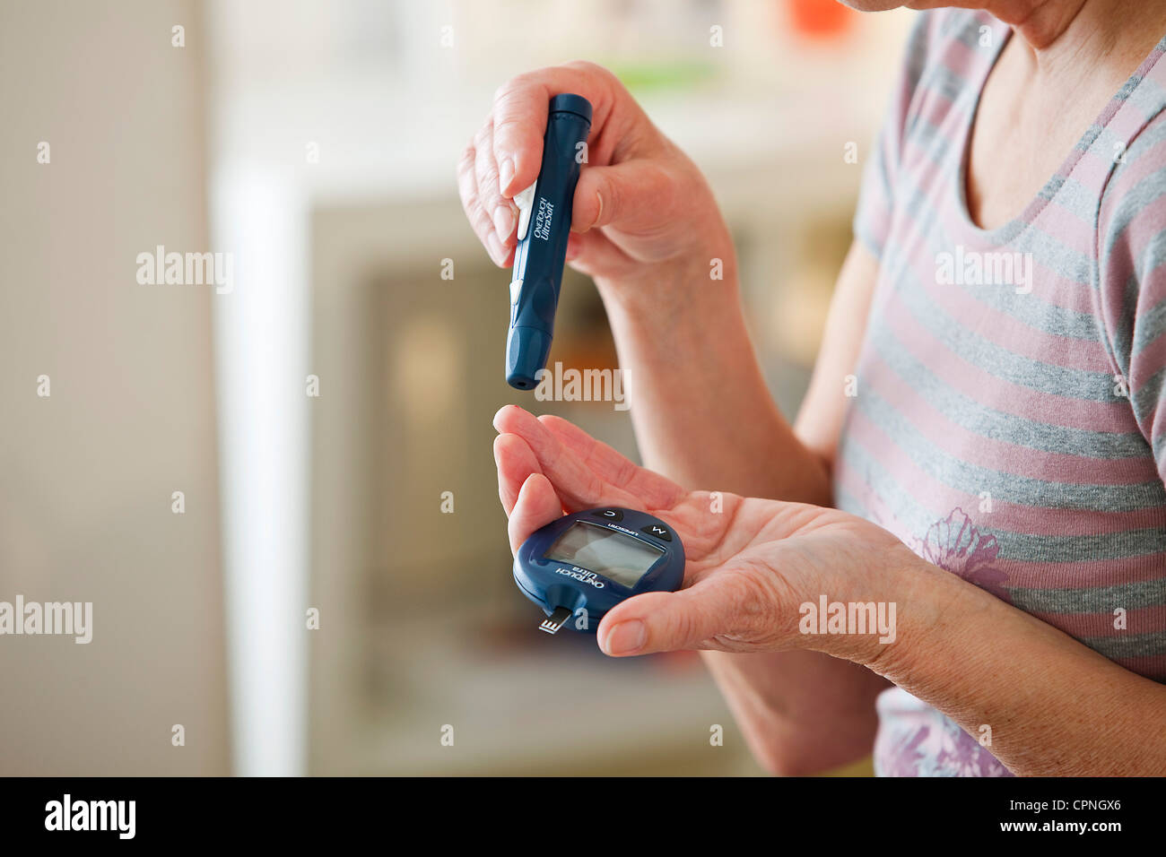 TEST FOR DIABETES ELDERLY PERSON Stock Photo Alamy