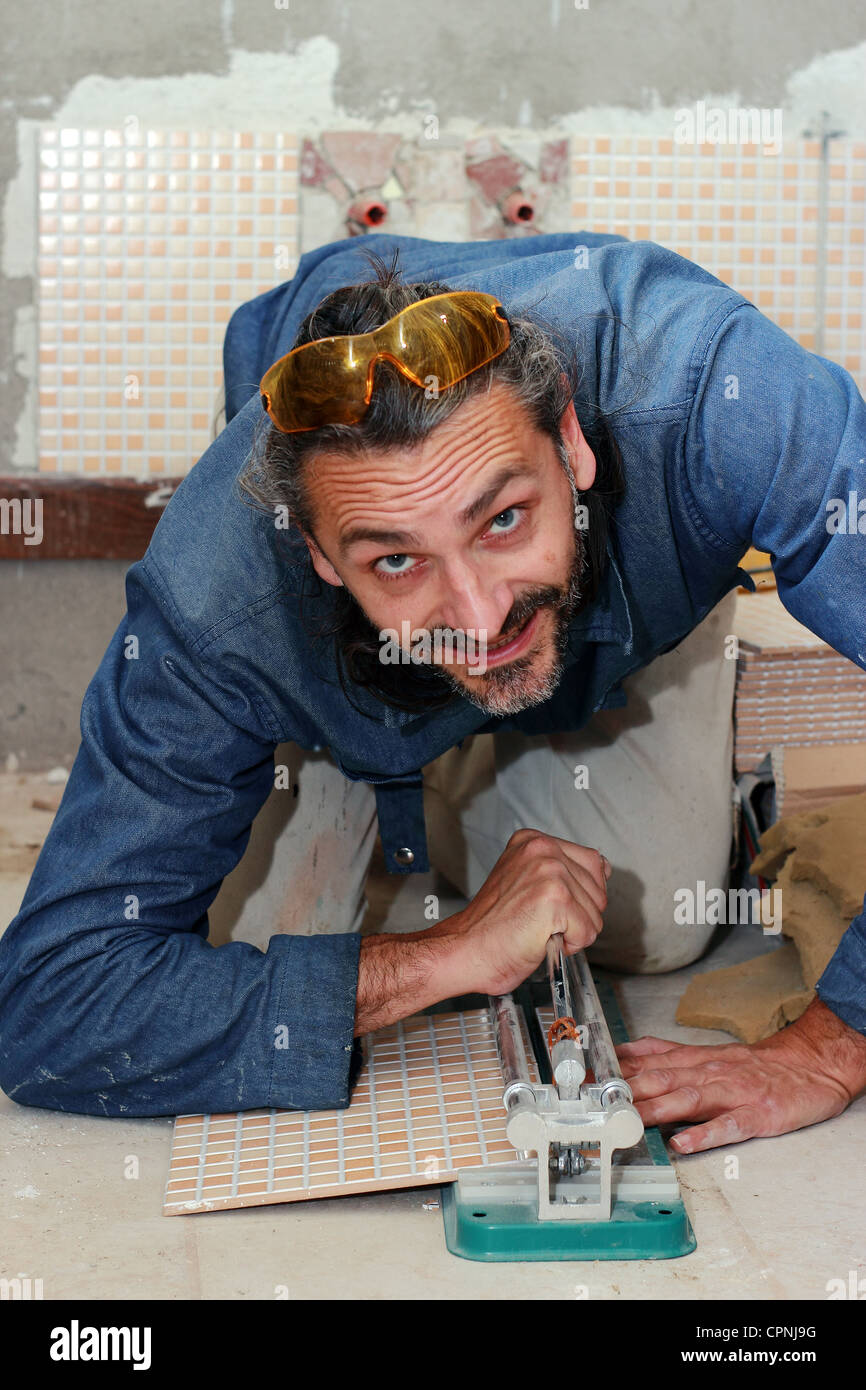 Cutting tiles hi-res stock photography and images - Alamy