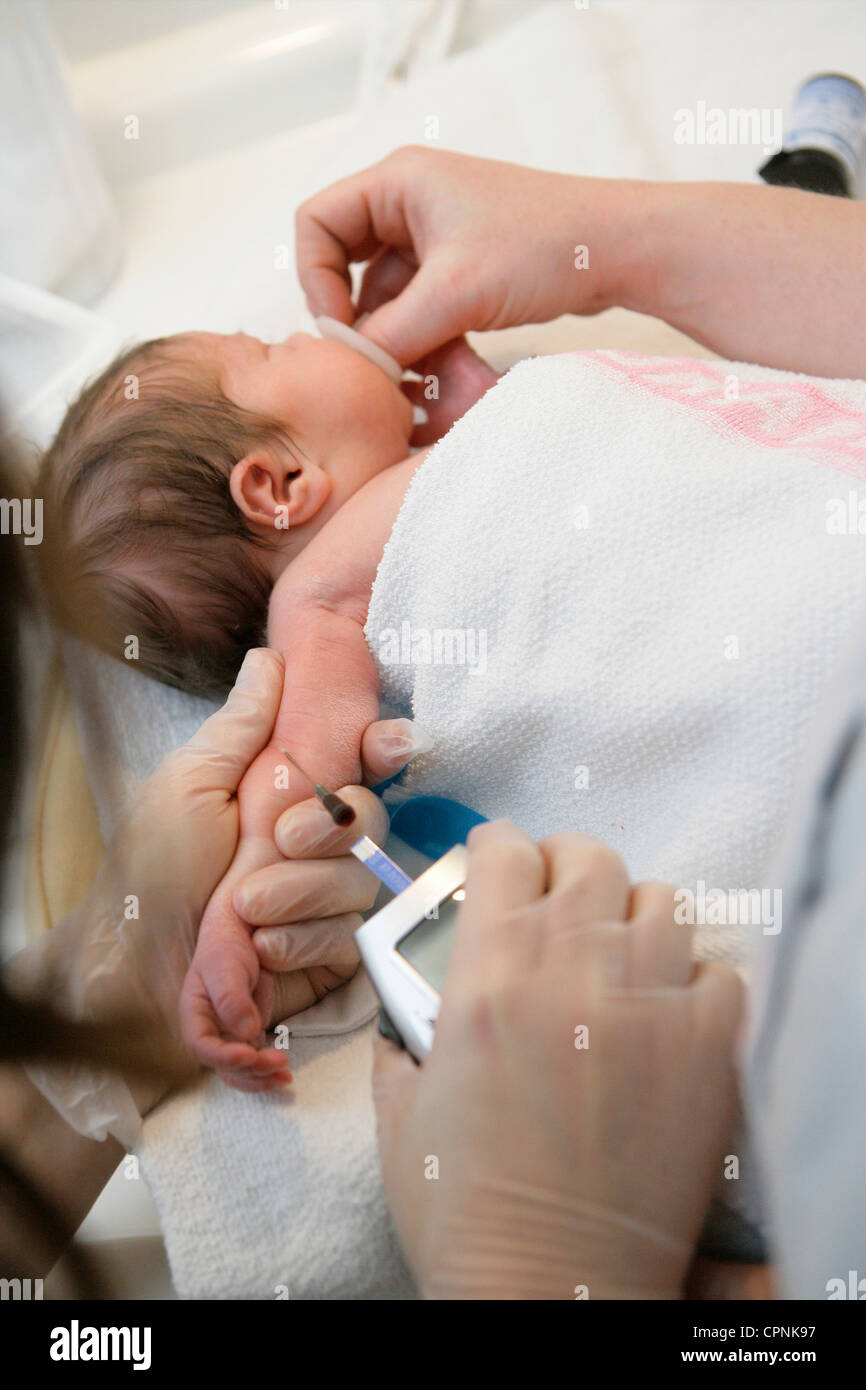 GLYCEMIA TEST FOR NEWBORN BABY Stock Photo - Alamy