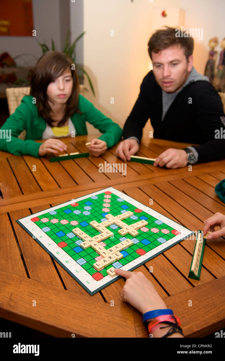 FAMILY PLAYING INDOORS Stock Photo - Alamy