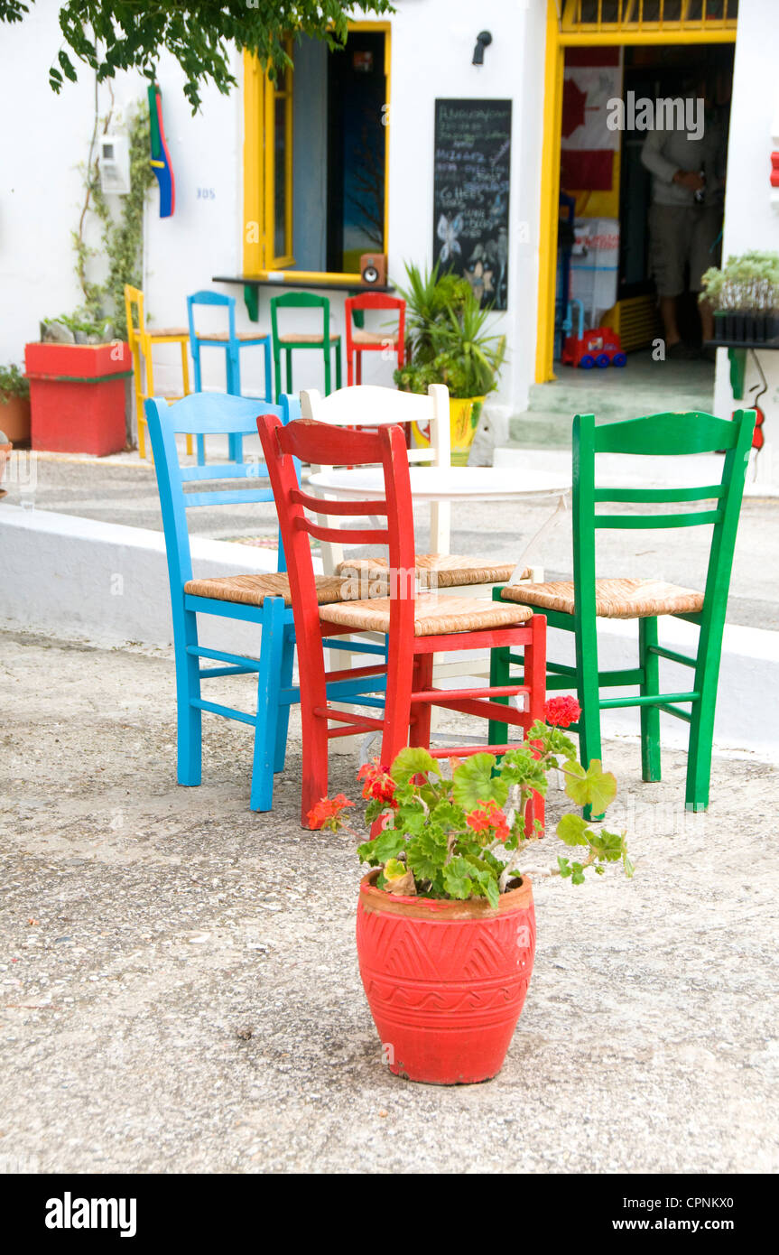Greek Island cafe setting colorful chairs Plaka Milos Cyclades Greece ...