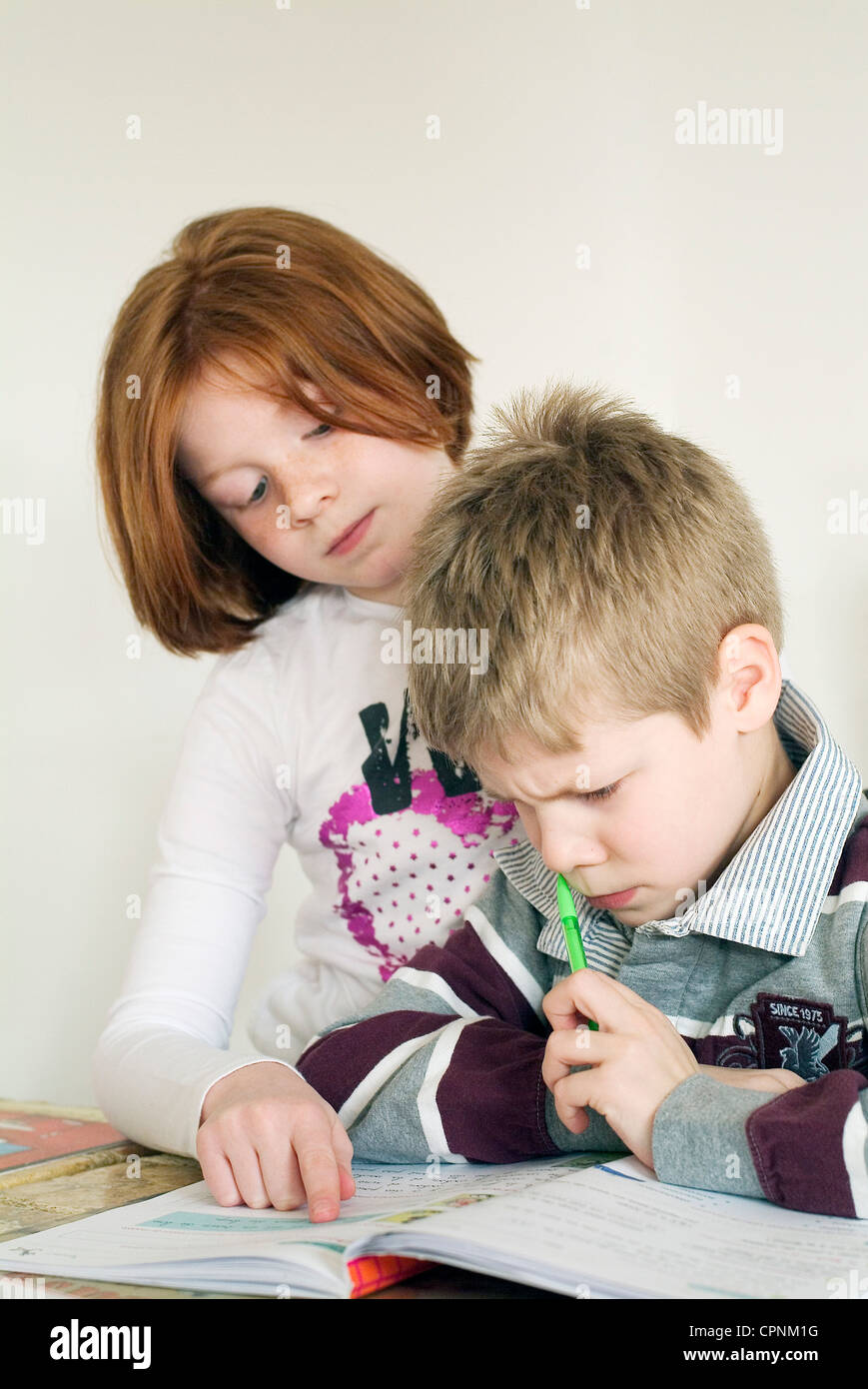CHILD DOING HOMEWORK Stock Photo - Alamy