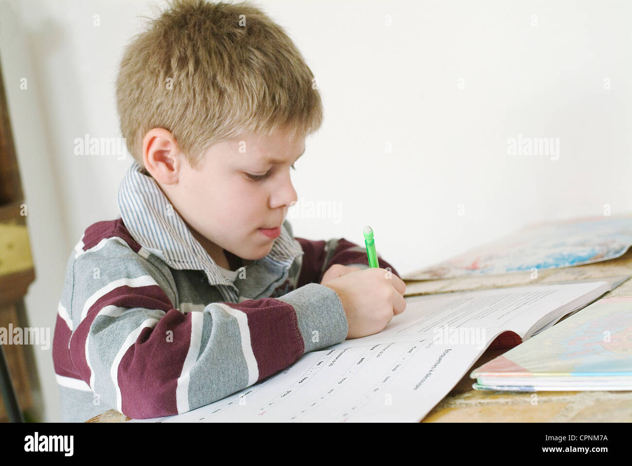 CHILD DOING HOMEWORK Stock Photo - Alamy