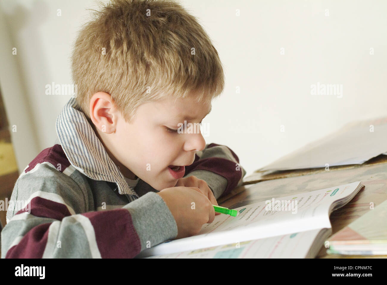 CHILD DOING HOMEWORK Stock Photo - Alamy