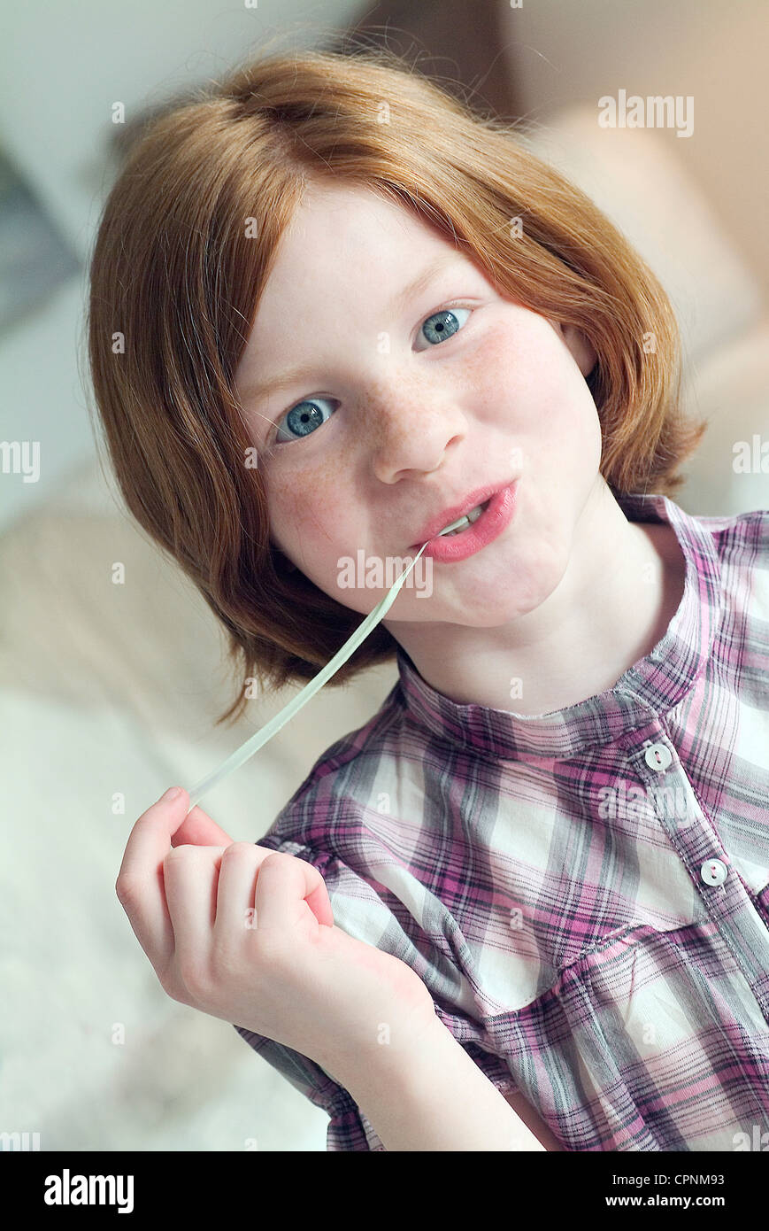 CHILD CHEWING GUM Stock Photo - Alamy