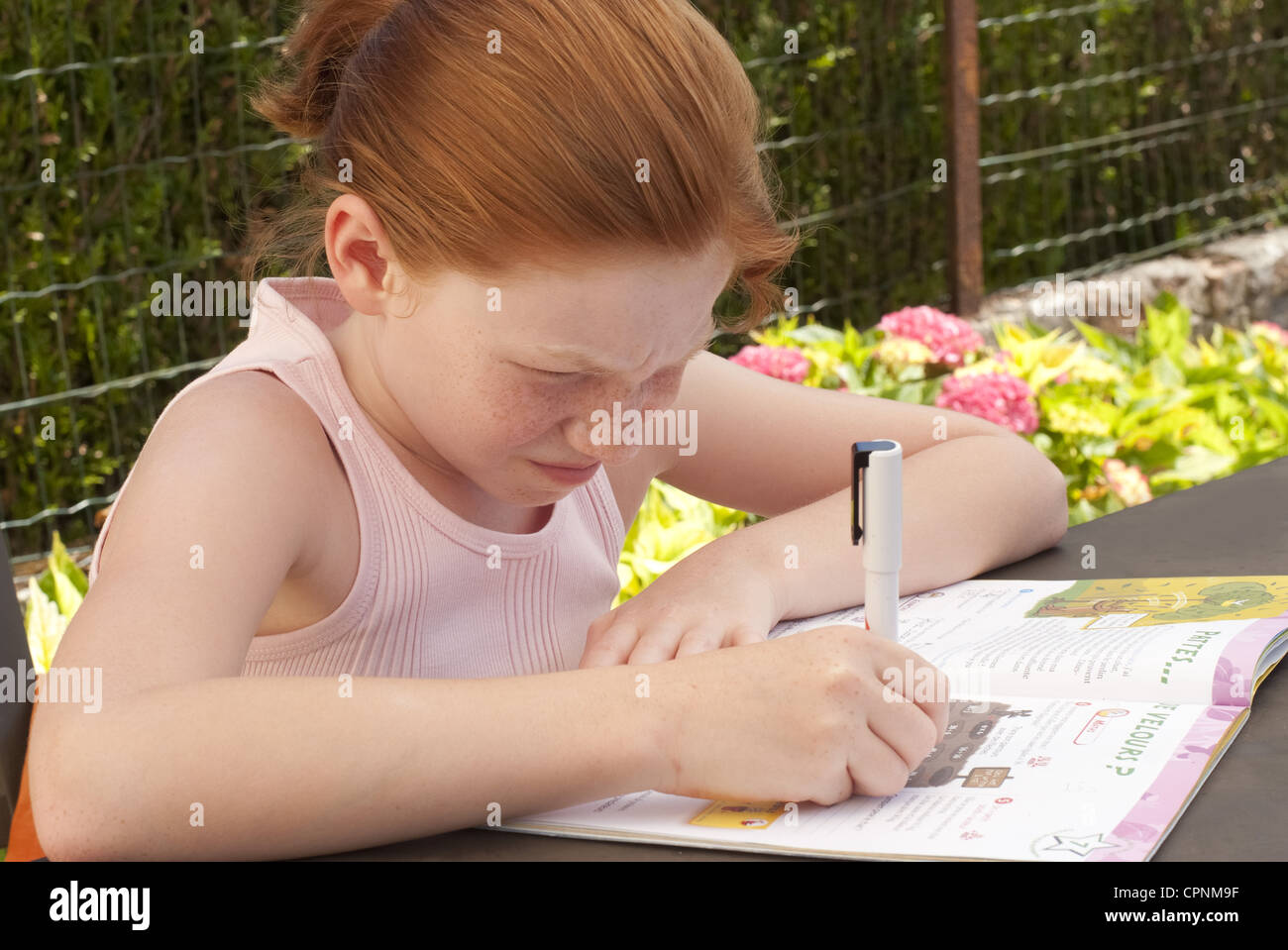 Grumpy child writing hi-res stock photography and images - Alamy