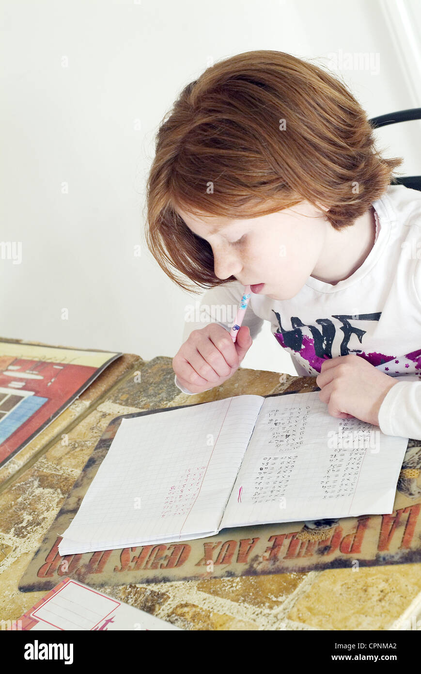 CHILD DOING HOMEWORK Stock Photo - Alamy