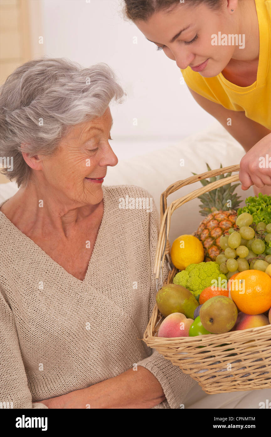 ELDERLY PERSON EATING FRUIT Stock Photo - Alamy