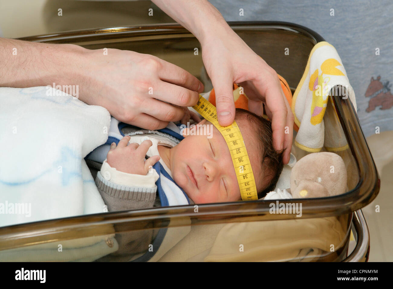Head circumference measurement hi-res stock photography and images - Alamy
