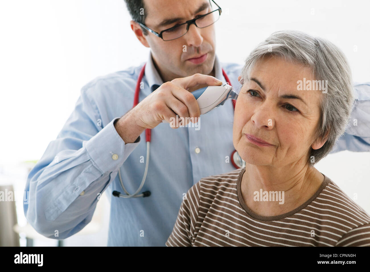 TEMPERATURE ELDERLY PERSON Stock Photo - Alamy