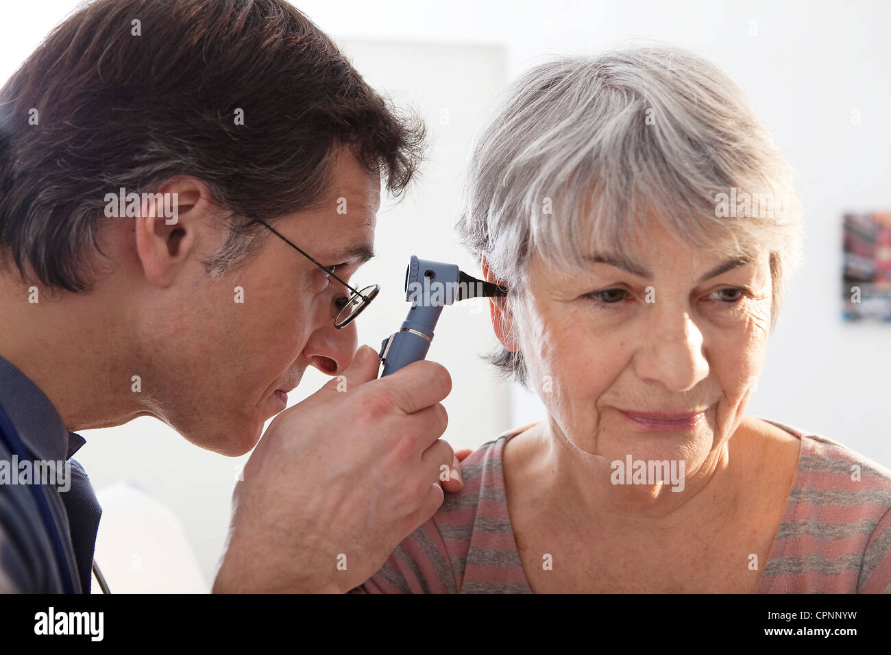 Older persons ear hi-res stock photography and images - Alamy