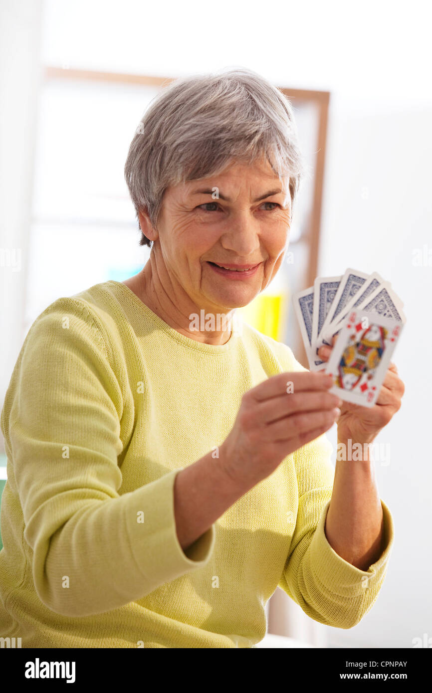 ELDERLY P. PLAYING A GAME Stock Photo - Alamy