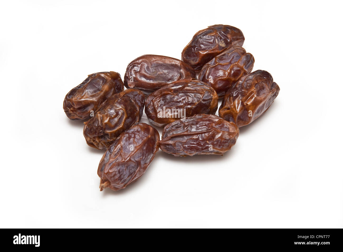 Dried Medjool dates isolated on a white studio background Stock Photo ...