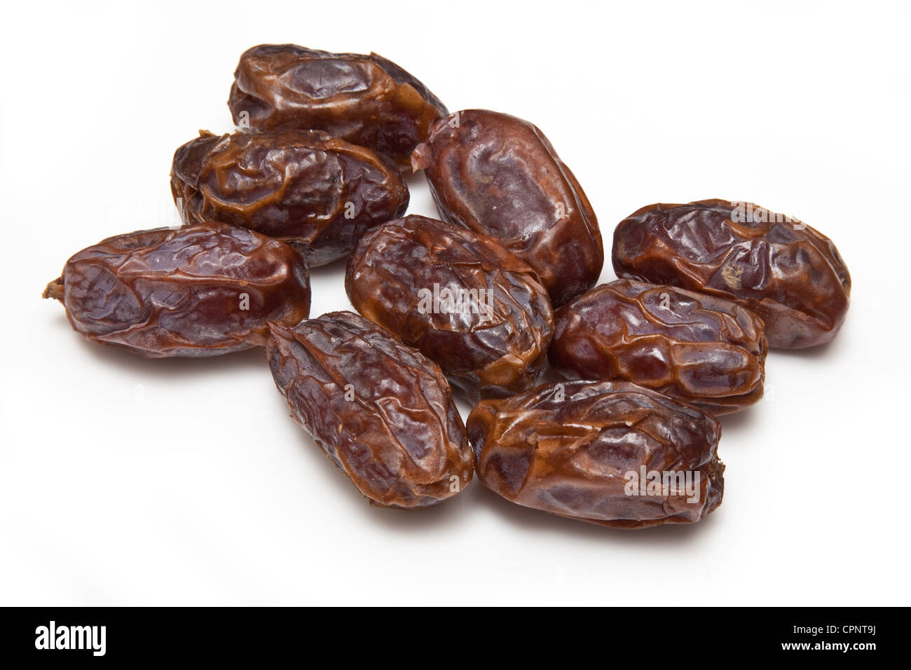 Dried Medjool dates isolated on a white studio background Stock Photo ...