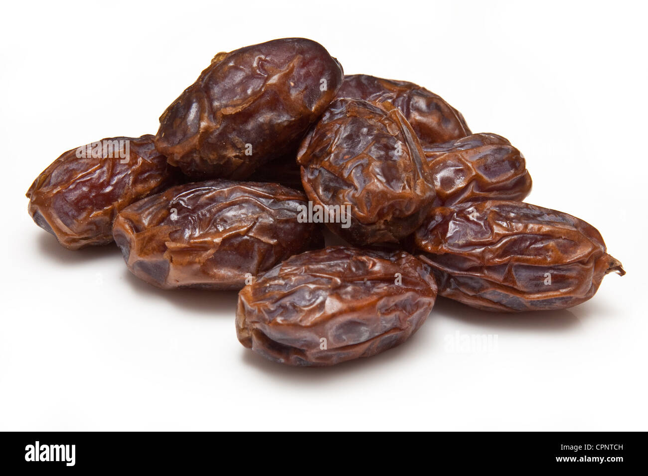 Dried Medjool dates isolated on a white studio background Stock Photo ...