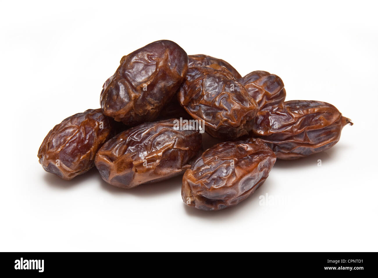 Dried Medjool dates isolated on a white studio background Stock Photo ...