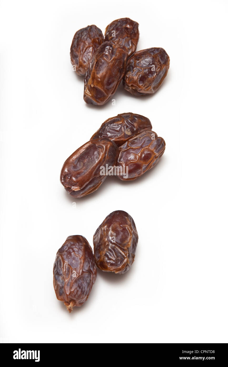 Dried Medjool dates isolated on a white studio background Stock Photo ...
