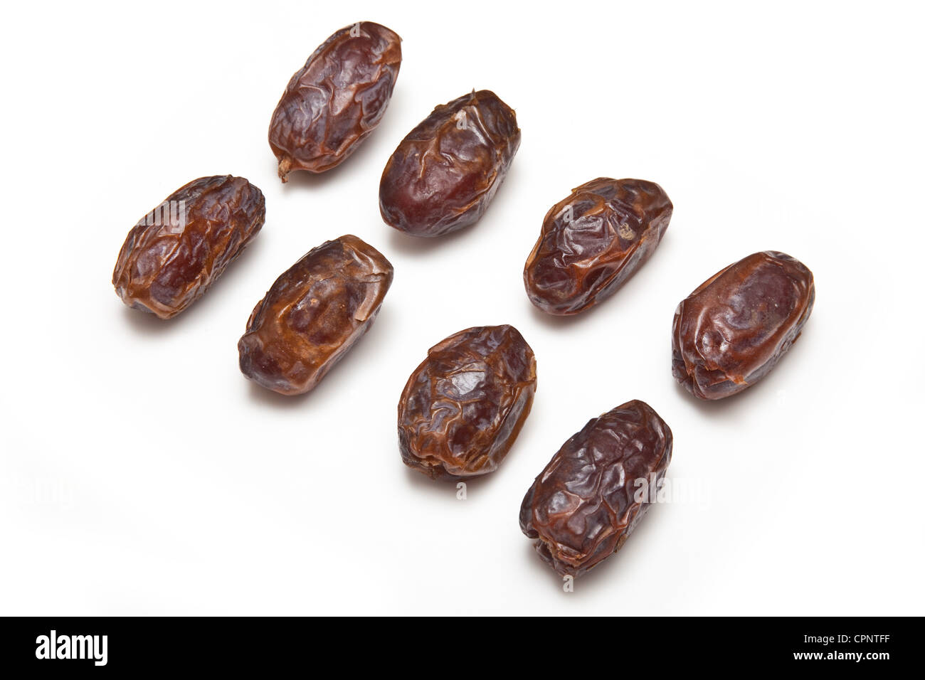 Dried Medjool dates isolated on a white studio background Stock Photo ...