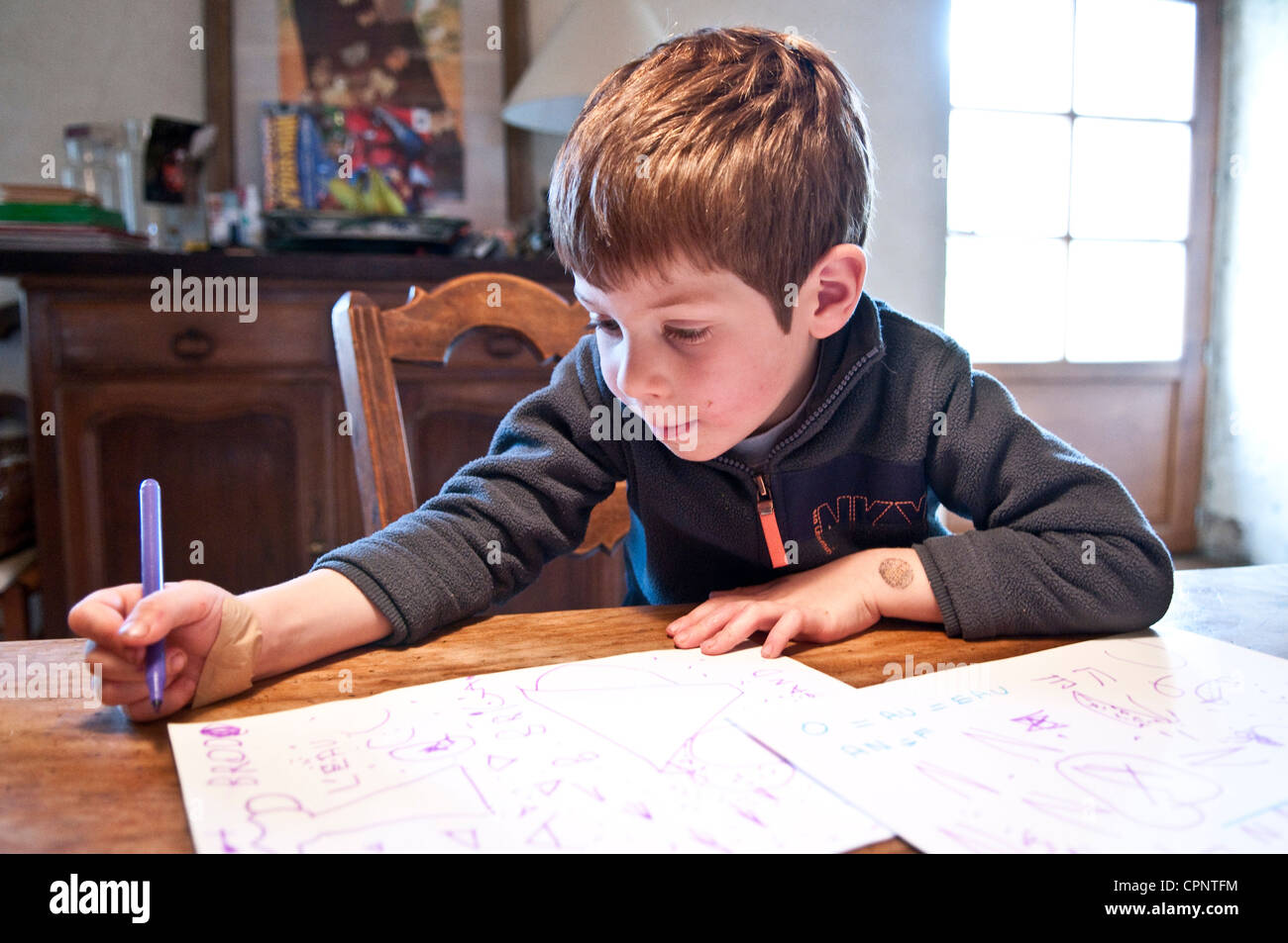 9 year old boy drawing hi-res stock photography and images - Alamy