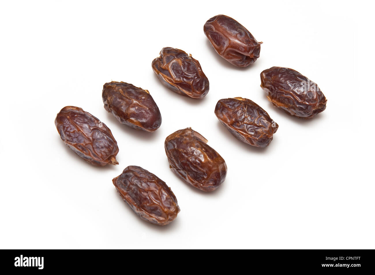 Dried Medjool dates isolated on a white studio background Stock Photo ...