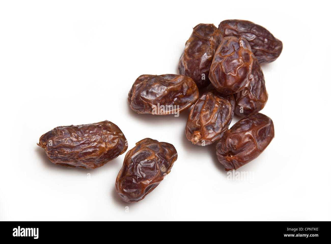 Dried Medjool dates isolated on a white studio background Stock Photo ...