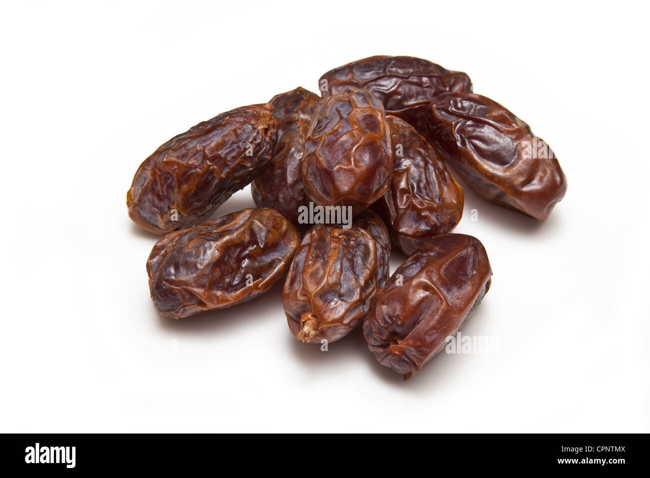 Dried Medjool dates isolated on a white studio background Stock Photo ...
