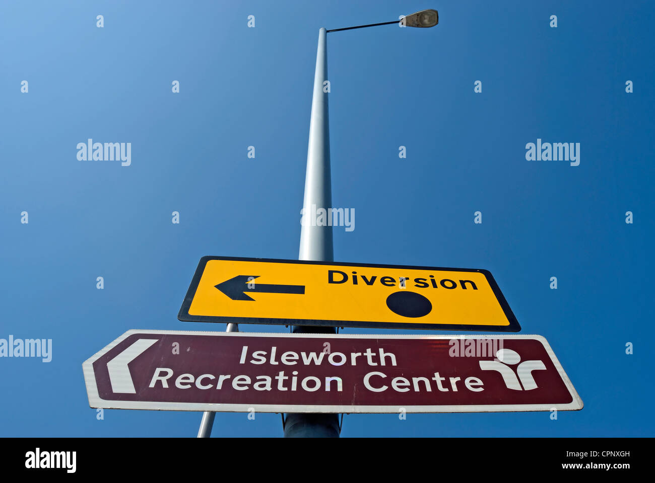 british road sign indicating a diversion route and local sign for ...