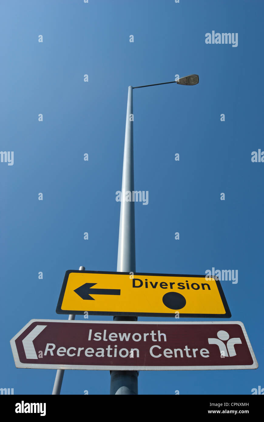 british road sign indicating a diversion route and local sign for ...