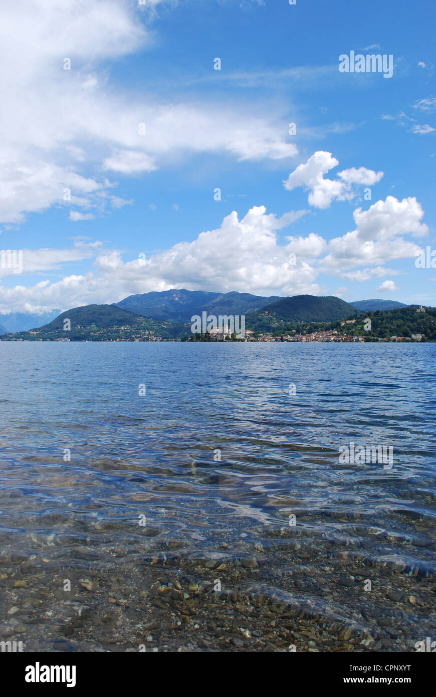 Panoramic view of Orta lake in summer with Alps mountains in background ...