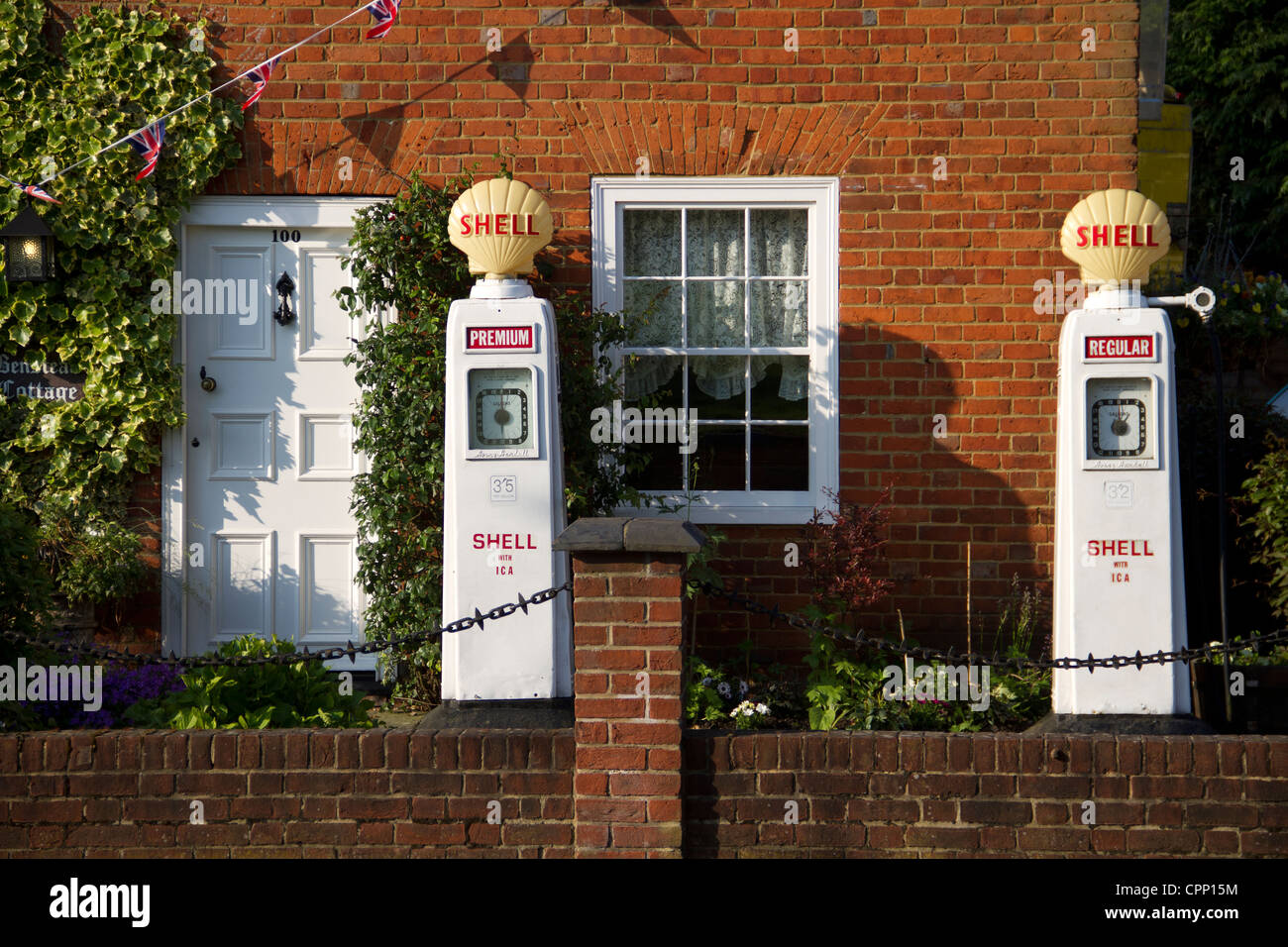 Vintage Shell petrol pumps on display in Horsell High Street Stock ...