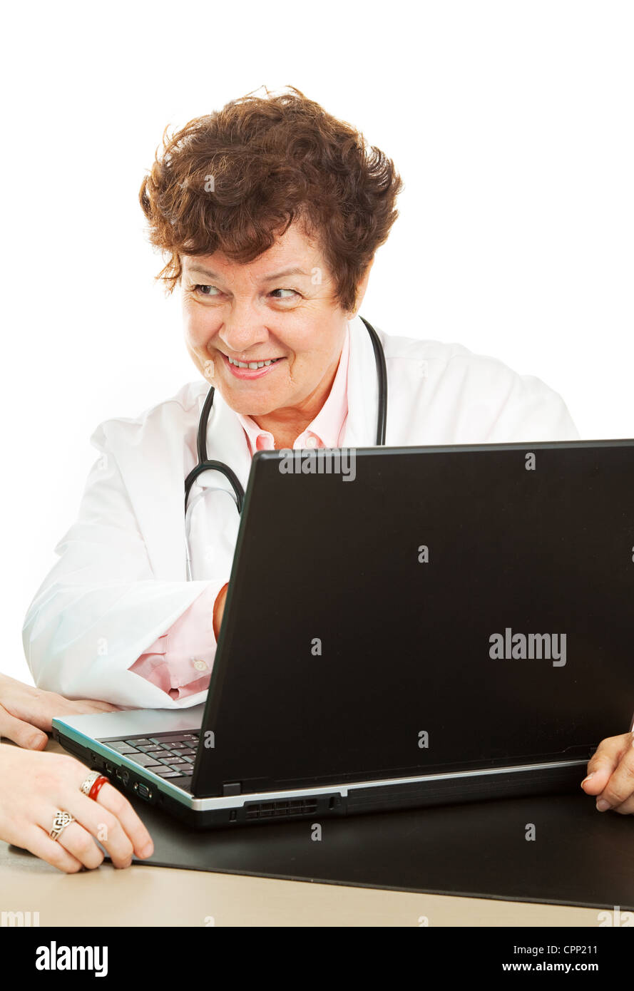 Female doctor showing a patient her test results on the computer ...