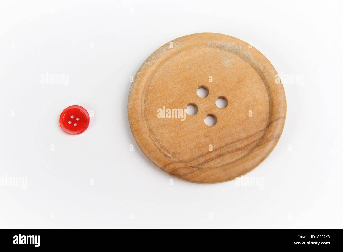 A large and small button Stock Photo - Alamy
