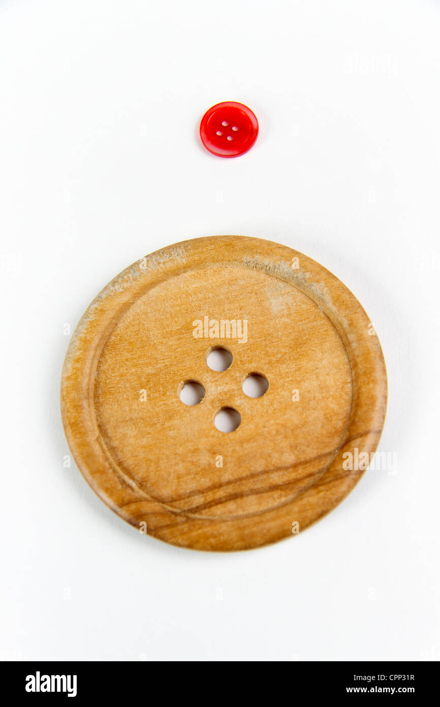 A large and small button Stock Photo - Alamy