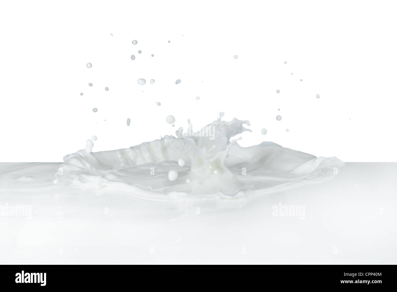 splashing milk isolated on white background Stock Photo - Alamy