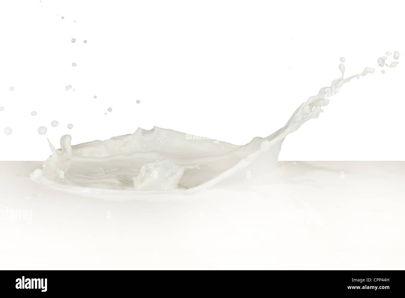 splashing milk isolated on white background Stock Photo - Alamy