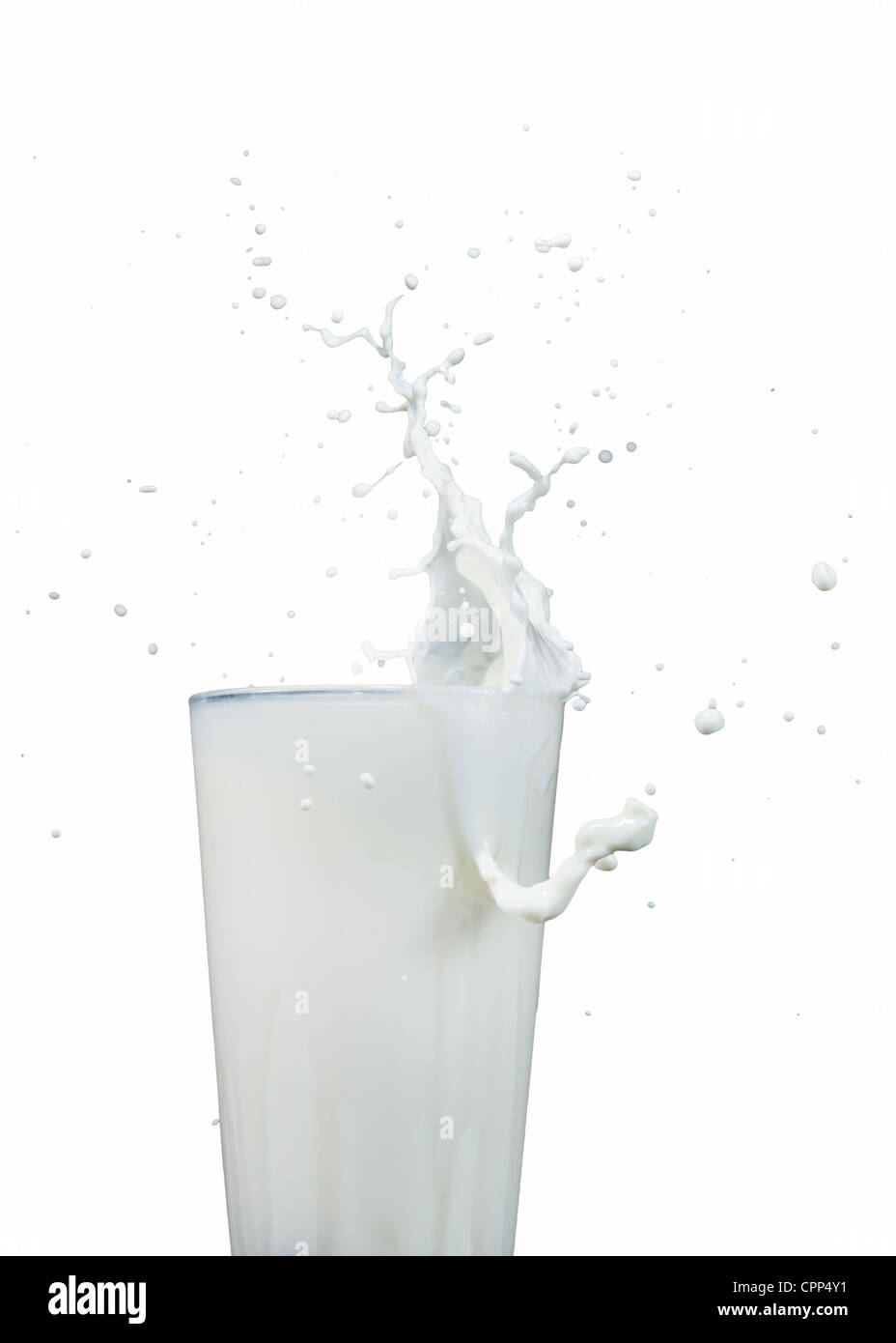 milk splashing from the glass Stock Photo - Alamy