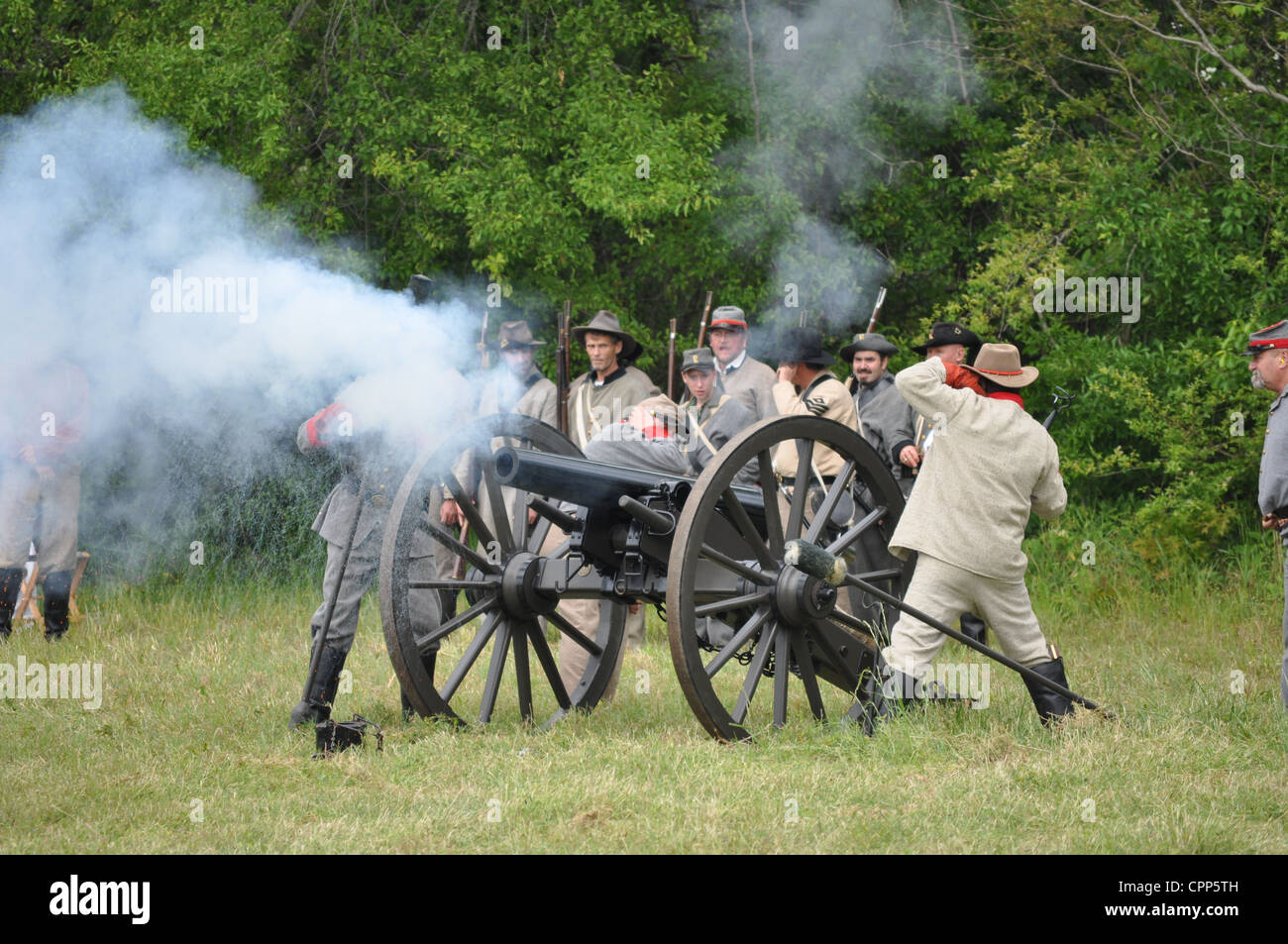 A Cannon being fired at a Civil War Reenactment Stock Photo - Alamy