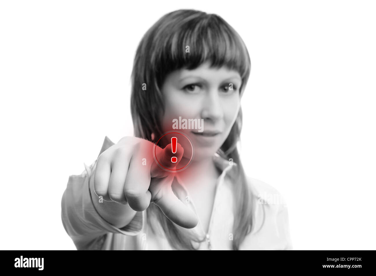 young woman presses the red button on a white background Stock Photo ...