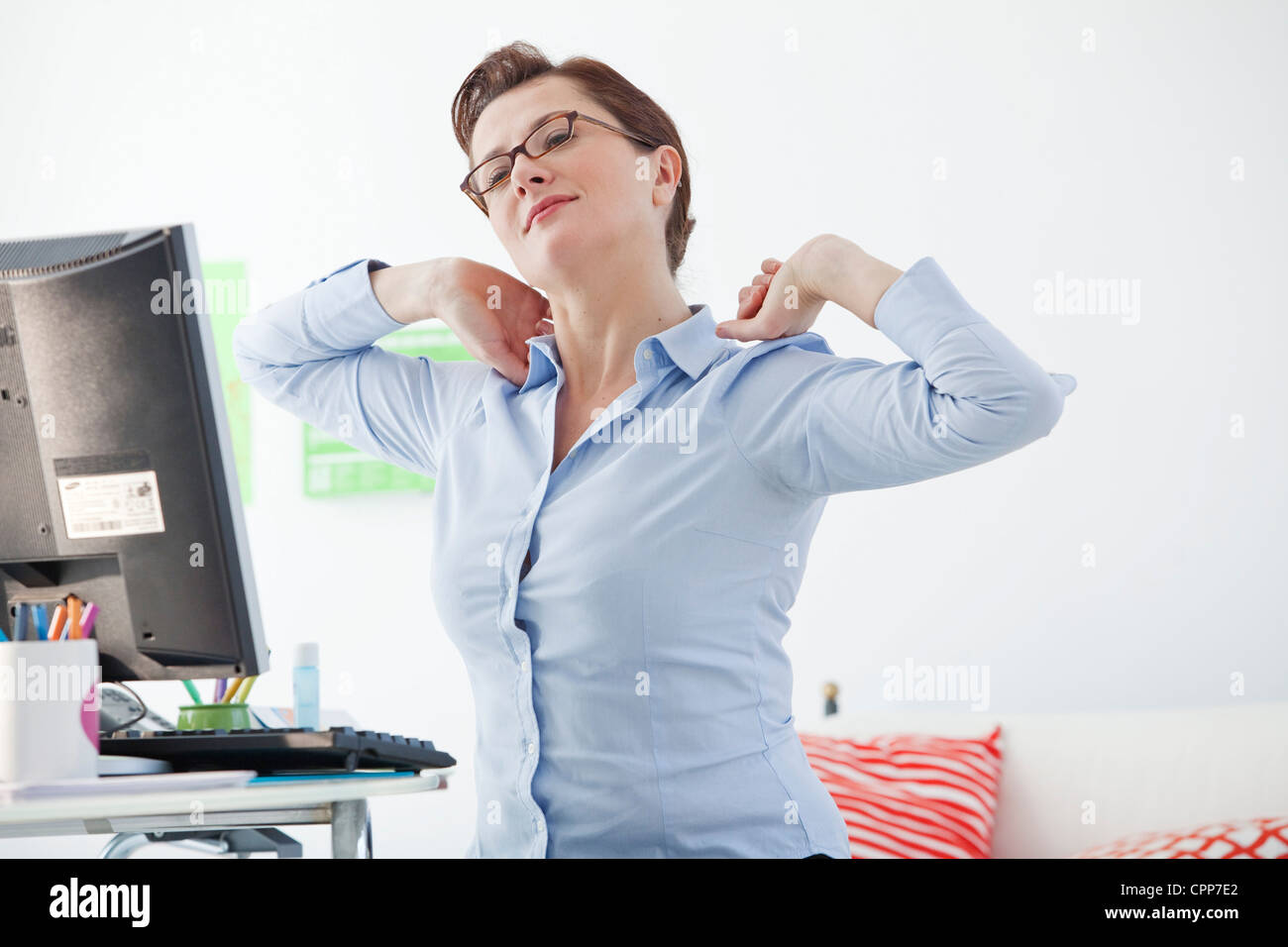 Woman stretch computer hi-res stock photography and images - Alamy