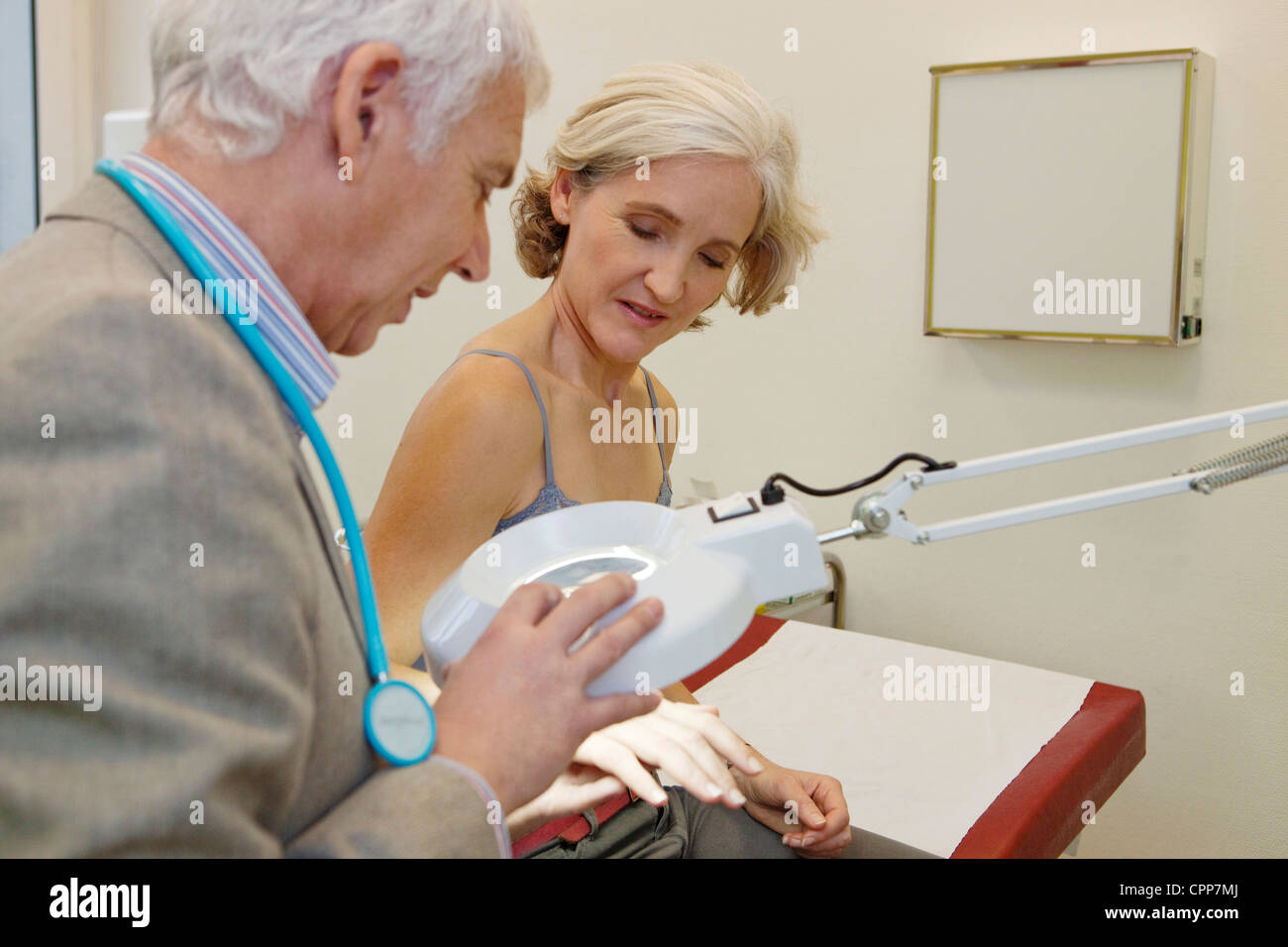 DERMATOLOGY CONSULTATION WOMAN Stock Photo - Alamy