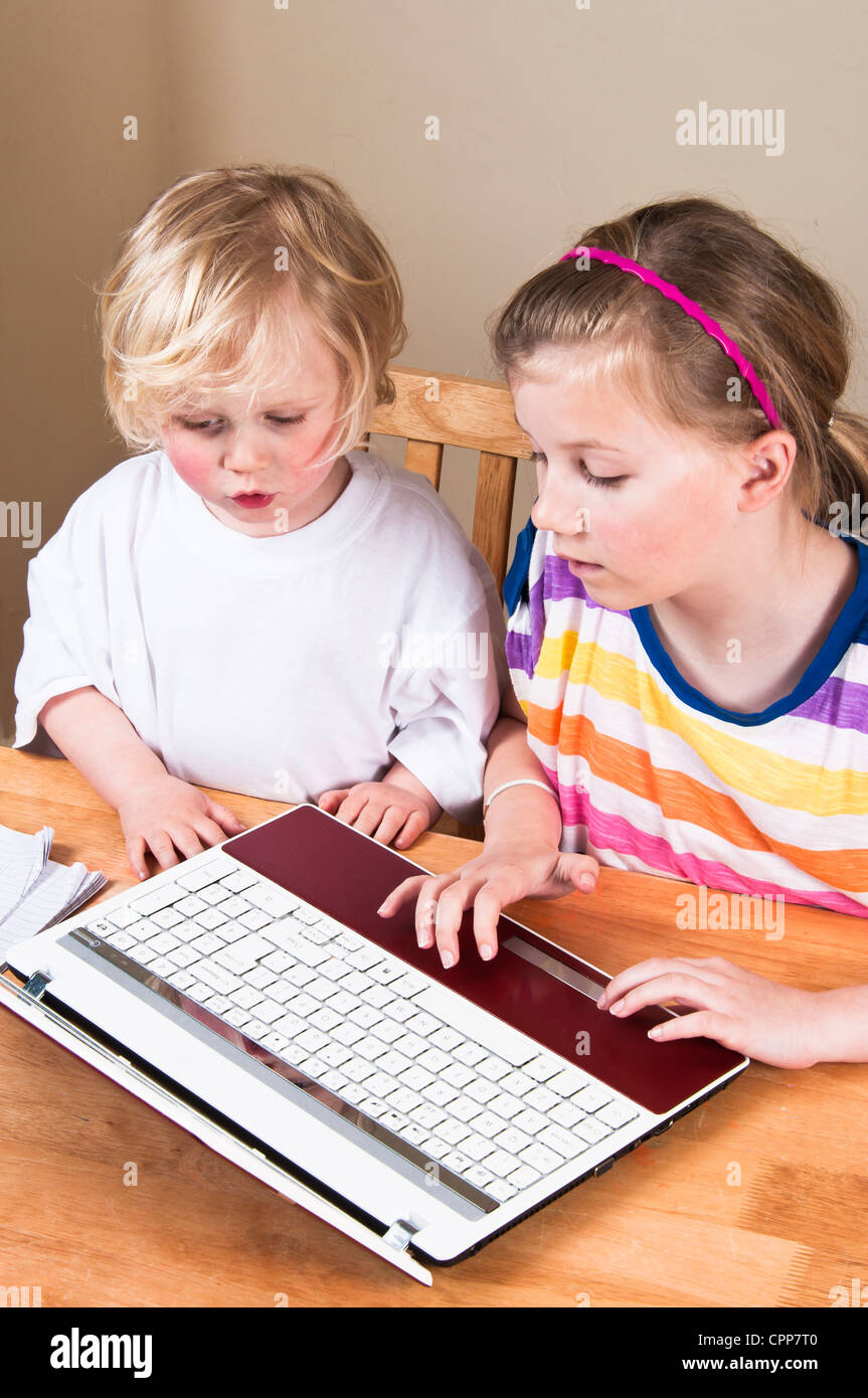 Children using laptop computer Stock Photo - Alamy