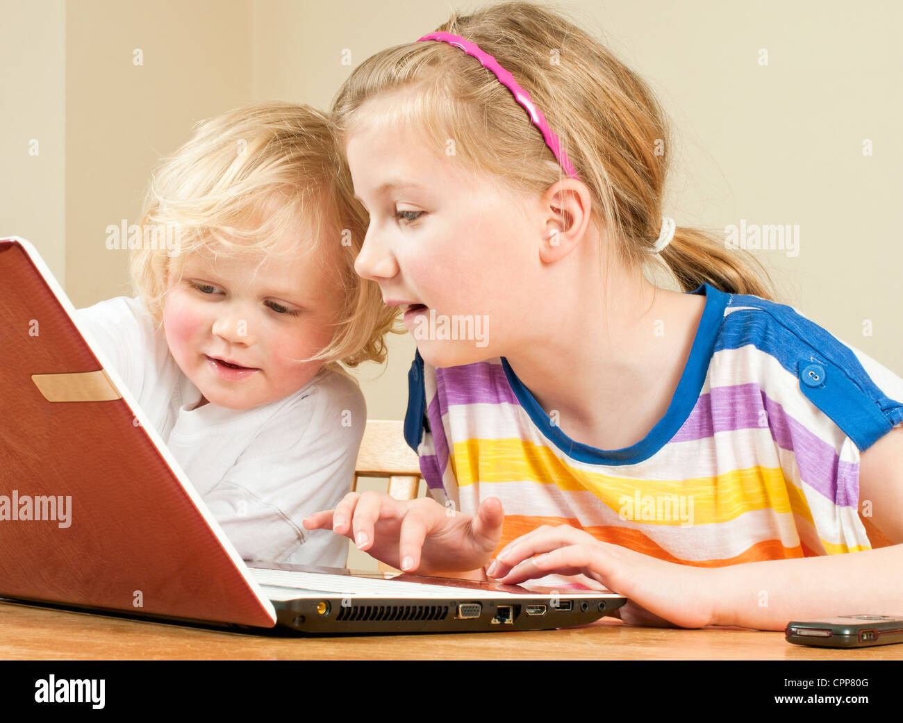 Children using a laptop Stock Photo - Alamy