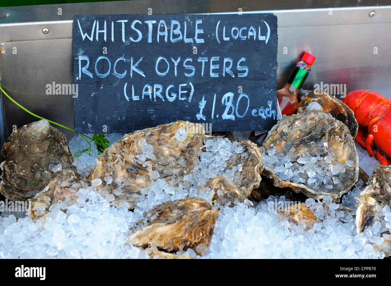 Sign for rock oysters, Whitstable, Kent Stock Photo - Alamy