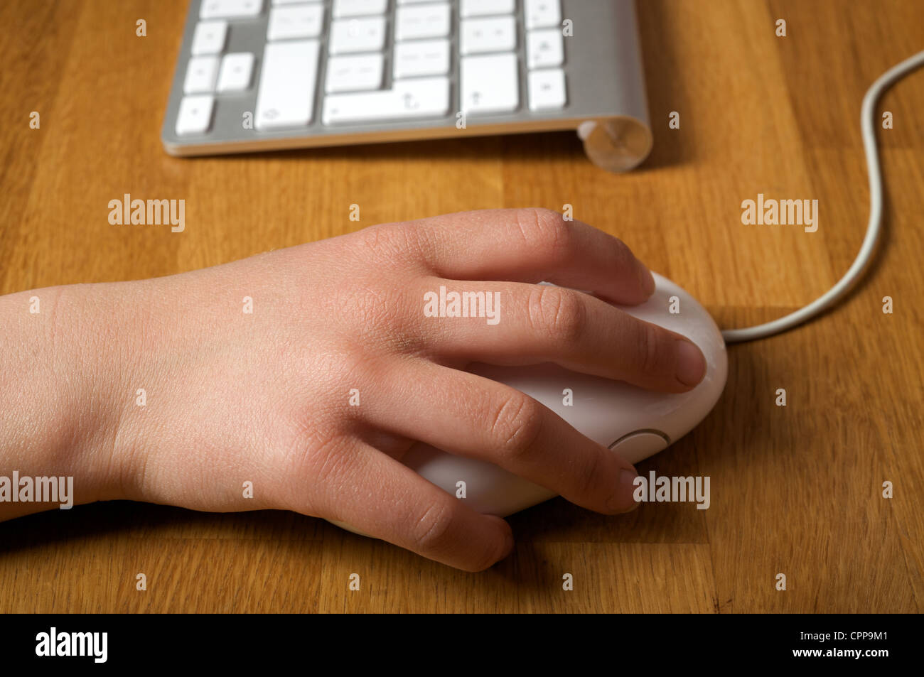 Child using a computer mouse Stock Photo - Alamy Child using a computer mouse Stock Photo - Alamy